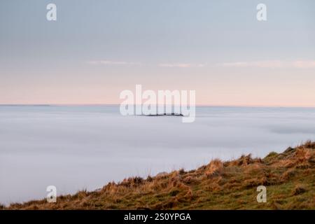 A winter sunrise landscape vignette of Bosley Cloud, Congleton during a ...