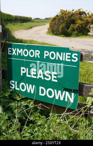Road Sign Please Slow Down Due To Exmoor Ponies, Exmoor National Park ...