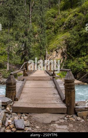 A traditional wooden bridge over the Bheri River in Dolpa, Nepal Stock ...
