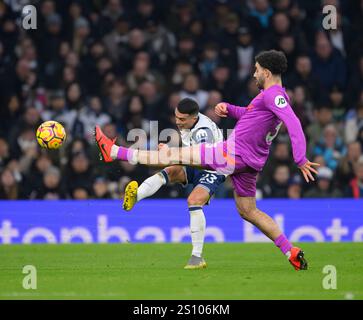Tottenham Hotspur's Pedro Porro (left) and Tamworth's Beck-Ray Enoru ...