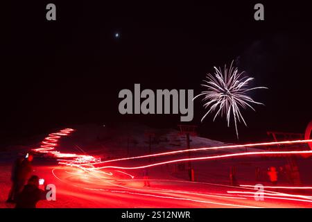 Festive Fireworks Over Snowy Mountain Ski Resort During Night ...