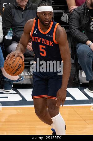 New York Knicks forward Precious Achiuwa (5) dunks during the first ...