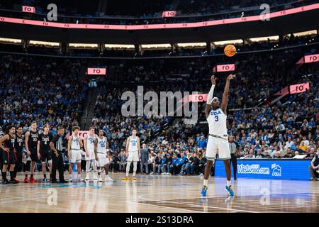 UCLA guard Eric Dailey Jr. (3) handles the ball during the first half ...