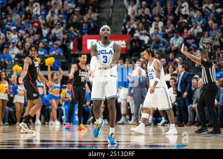 UCLA guard Eric Dailey Jr., left, and guard Donovan Dent celebrate ...