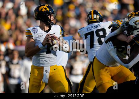 Quarterback Brendan Sullivan (Iowa Hawkeyes, #01) carries the ball for ...