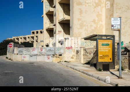 A bus stop by the abandoned Jerma Palace Hotel, Marsaskala, Malta Stock ...