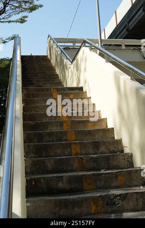 Street stairs leading up against a foggy night sky Stock Photo - Alamy