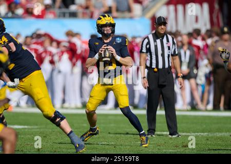Michigan quarterback Davis Warren against Alabama during the first half ...