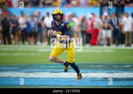 Michigan quarterback Davis Warren against Alabama during the first half ...