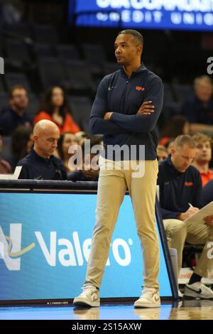 Virginia head coach Ron Sanchez directs the team during the first half ...