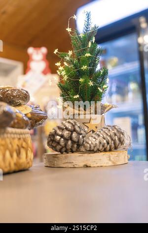 Small Christmas tree with decorations on white background Stock Photo ...