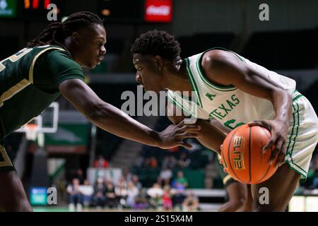 North Texas forward Brenen Lorient (6) shoots while defended by Memphis ...