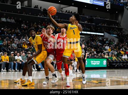Utah guard Miro Little (1) shoots the basketball during the first half ...