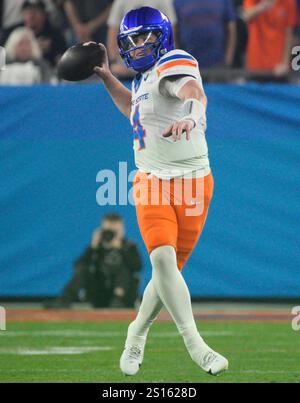 Boise State quarterback Maddux Madsen (4) looks downfield against UNLV ...