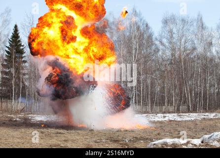 Explosion in action with fire ball and smoke Stock Photo - Alamy