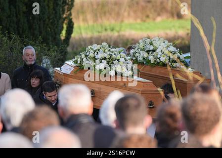 The coffins of father and son Peter and Loughlin Devlin, who were ...