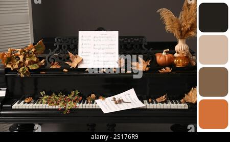 Autumn leaves, pumpkins and note sheets on grand piano. Different color ...