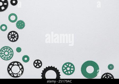 Different paper gears on grey background Stock Photo - Alamy