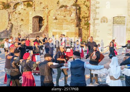 Group of people performing traditional Greek dance, Chania, Crete ...