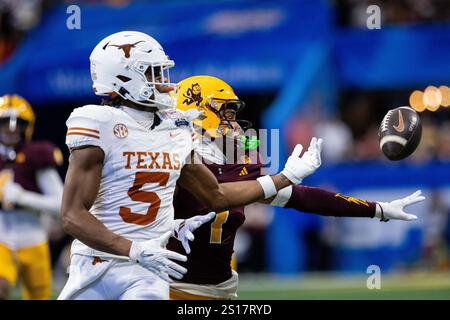 Texas wide receiver Ryan Wingo (1) is tackled by Georgia linebacker ...