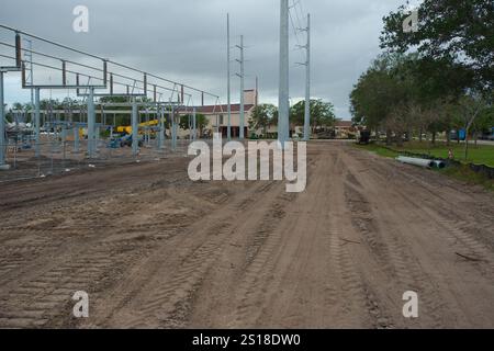 Wide view of an urban Electric substation. Construction vehicles With ...