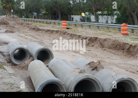 An installation of storm drainage drain pipe into trench drain for ...