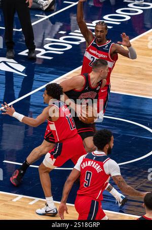 Chicago Bulls center Nikola Vucevic, drives to the basket past New ...
