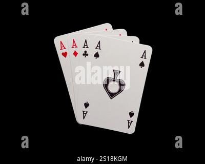 Four cards with different symbols on them. The top card has a heart ...