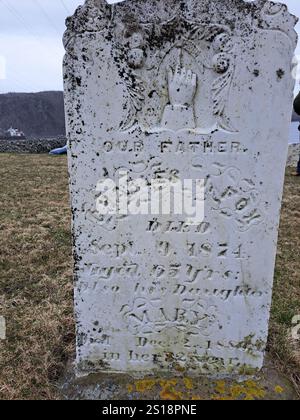 Weathered grave stones at the Canso Range Rear Lighthouse in Port ...