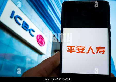 In this photo illustration, a Commercial Bank of Kuwait (Al-Tijari ...