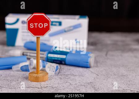 Wooden Stop Sign and Ozempic 1 ml Medications in Barcelona, Spain ...