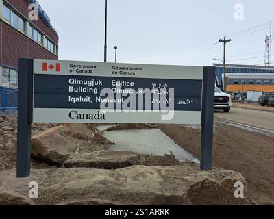 Multilingual Qimugjuk federal government building sign in English ...