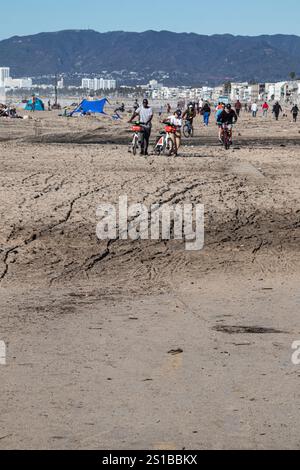 Beach sand overflows bike path after very high tides, Playa Del Rey ...