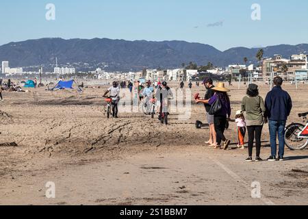 Beach sand overflows bike path after very high tides, Playa Del Rey ...