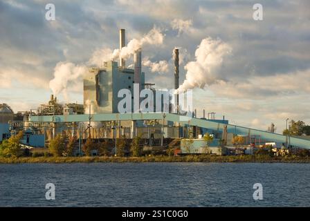 The Resolute Forest Products paper mill reflected in the Kaministiquia ...