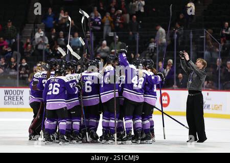 The Minnesota Frost celebrate after winning Game 4 of the PWHL hockey ...