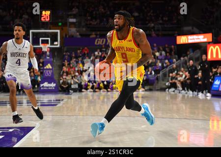 Maryland guard Selton Miguel (9) drives to the basket and shoots the ...