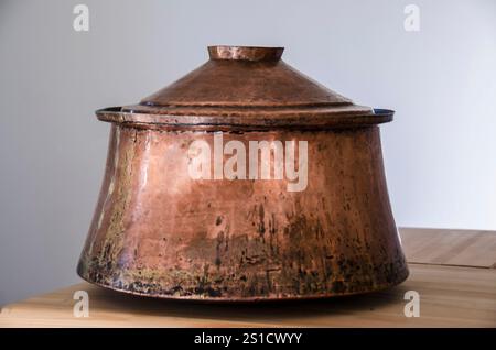 Old bronze utensil for cooking or decorative a place Stock Photo - Alamy