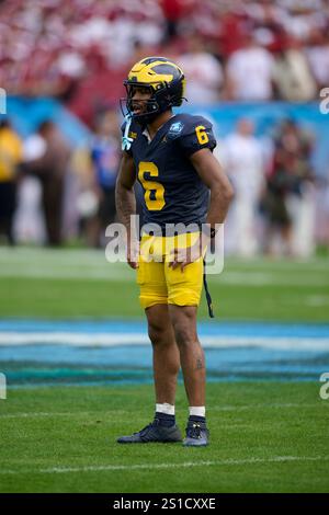 Michigan defensive back Brandyn Hillman, right, dances next to ...