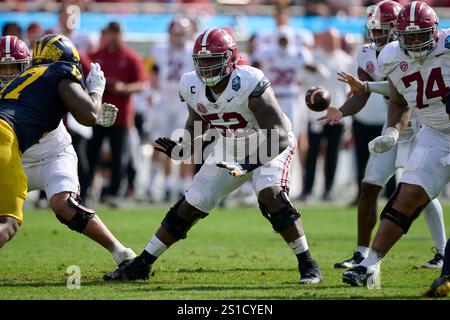 Alabama offensive lineman Tyler Booker runs a drill at the NFL football ...