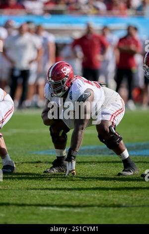 Alabama offensive lineman Tyler Booker runs a drill at the NFL football ...