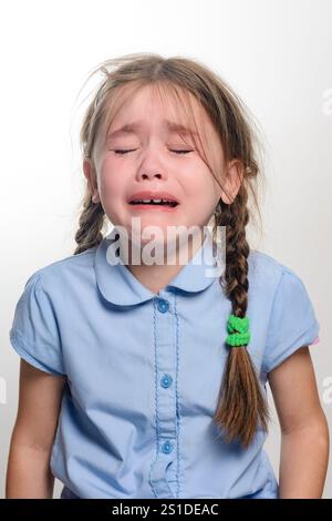 Sad unhappy crying little girl Stock Photo - Alamy