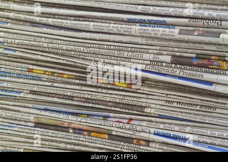 Pile of newspapers lying down Stock Photo - Alamy