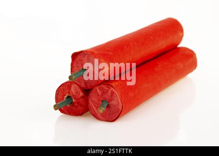 Red firework body on a white background Stock Photo - Alamy