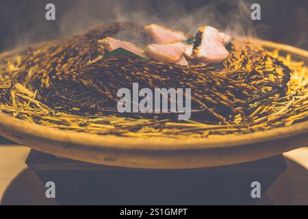 japanese winter Amberjack yellowtail fish smoked in Japanese rice straw ...