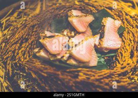 japanese winter Amberjack yellowtail fish smoked in Japanese rice straw ...