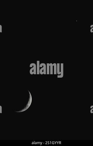 Belfast, UK. 03rd Jan, 2025. Crescent Moon with Venus Credit: Bonzo ...