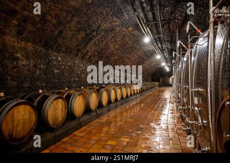 Second fermentation in barrels in caves, traditional method of ...