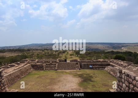 Ancient Stone Ruins Surrounded by Rolling Hills Under a Clear Sky ...
