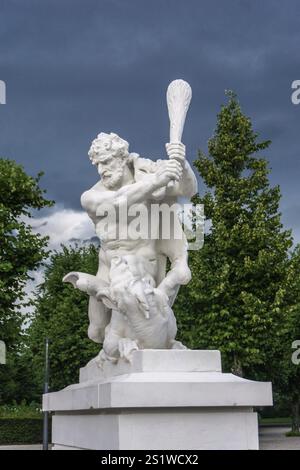 Statue of a strong man in front of the castle in Karlsruhe made of ...